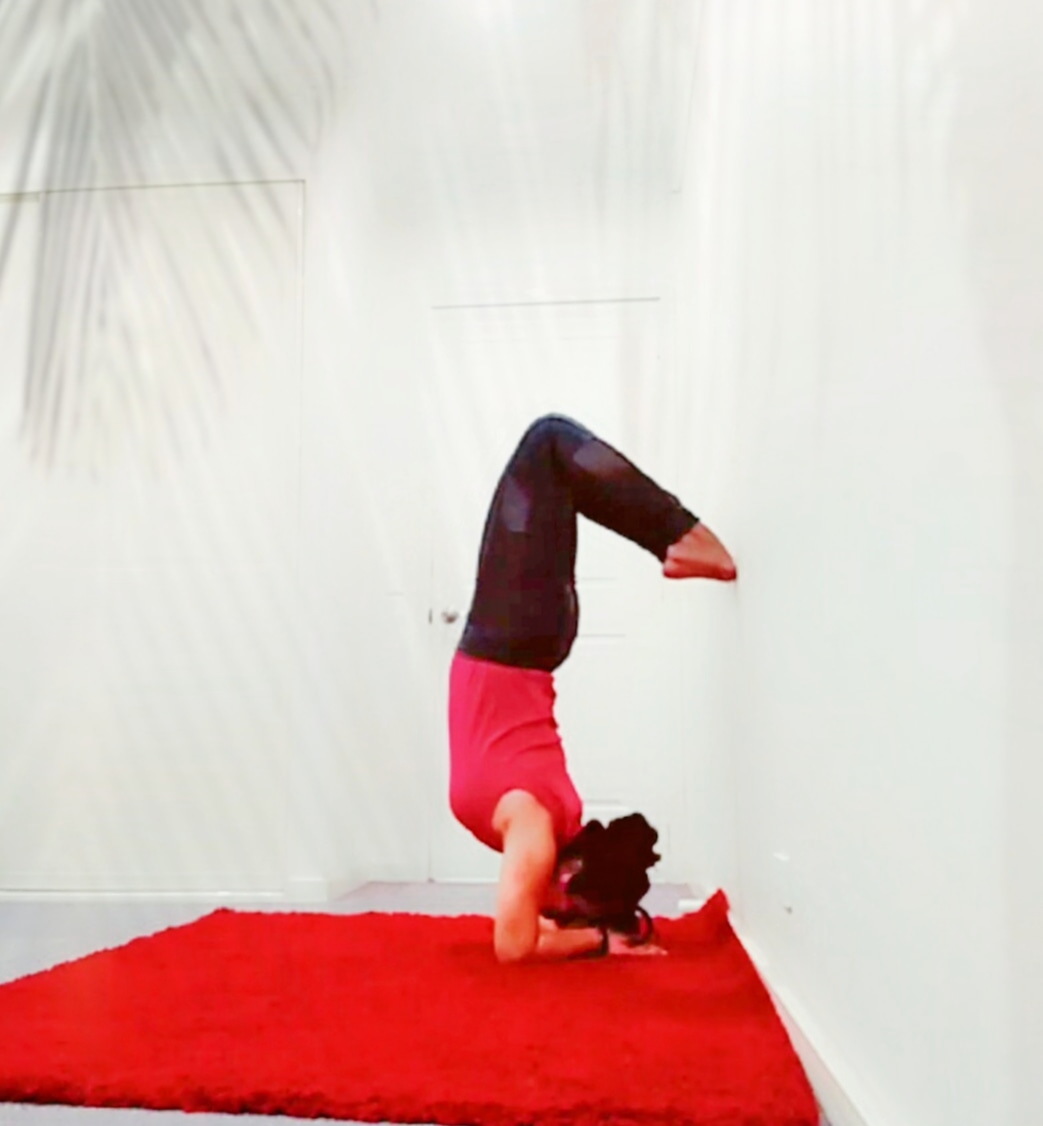 forearm balance with wall yoga pose - Destiny's Child